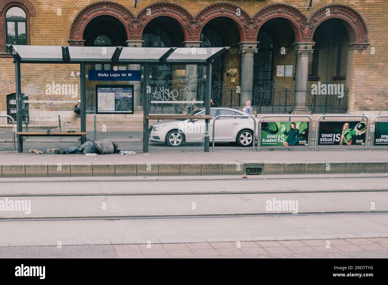 May 5, 2023, Budapest, Hungary: A homeless man is sleeping at the tram ...
