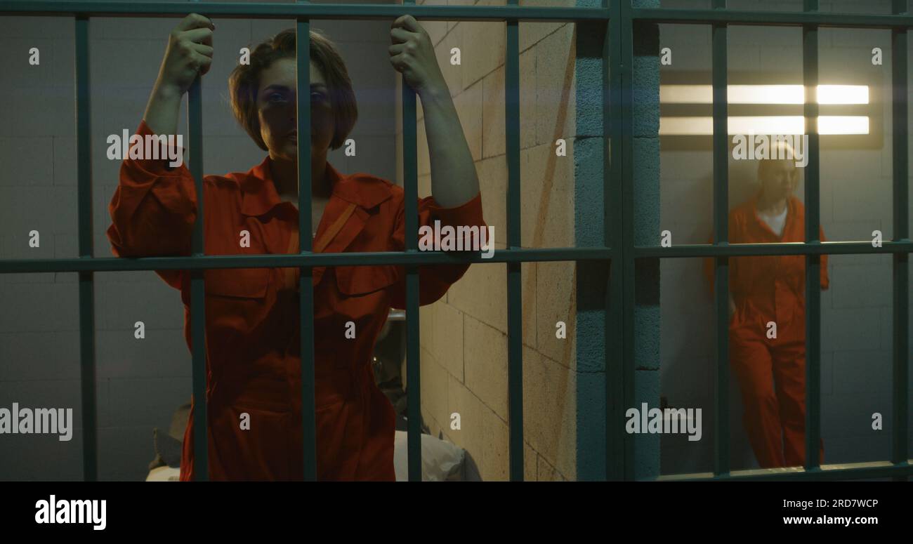 Female inmate sits in her prison cell hi-res stock photography and ...