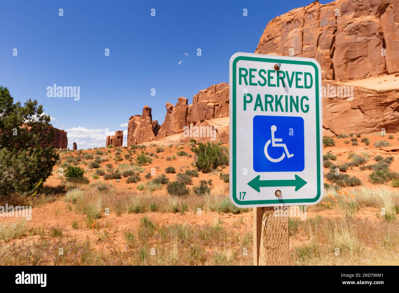 Reserved Parking Sign with Left and Right Arrows and Wheelchair Symbol ...