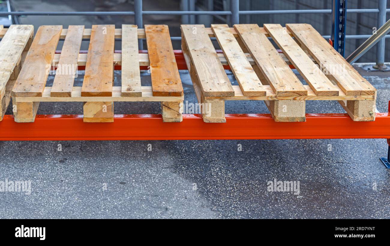 Empty Wooden Pallets at Warehouse Rack Shelf Storage Stock Photo - Alamy