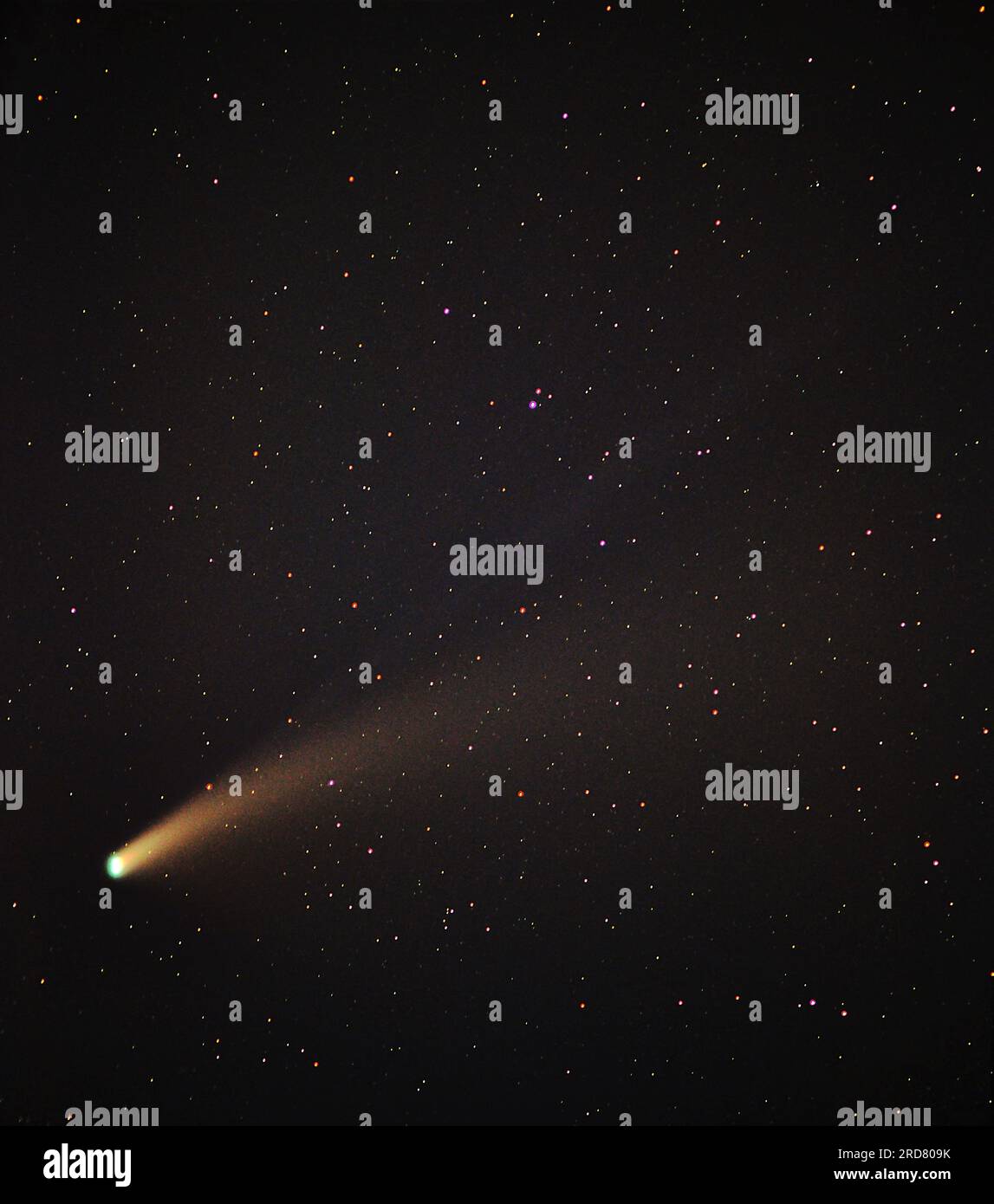 Comet Neowise C/2020 F3 with a tail against the background of outer ...