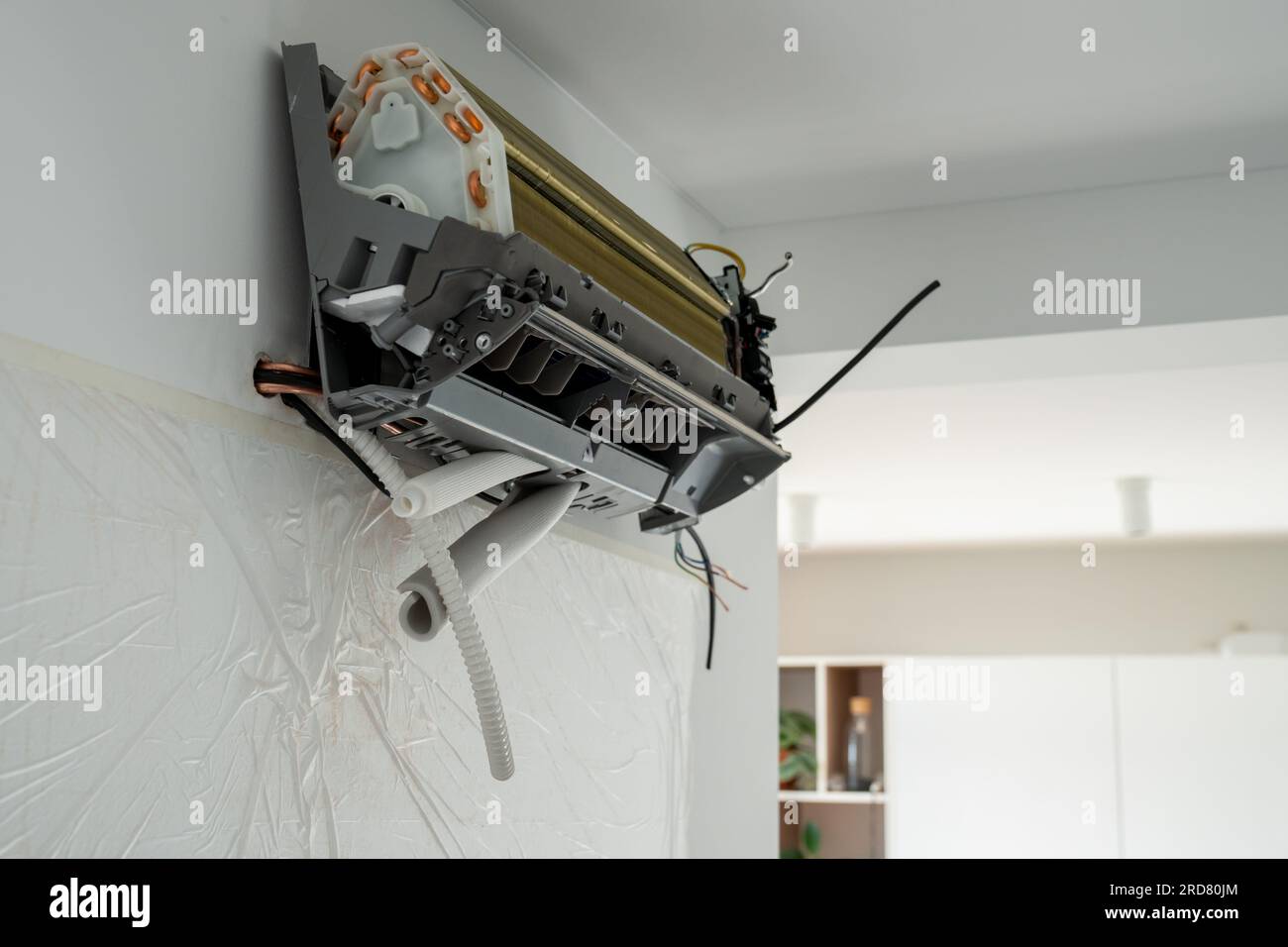 Installation air conditioning system in room with white wall in ...