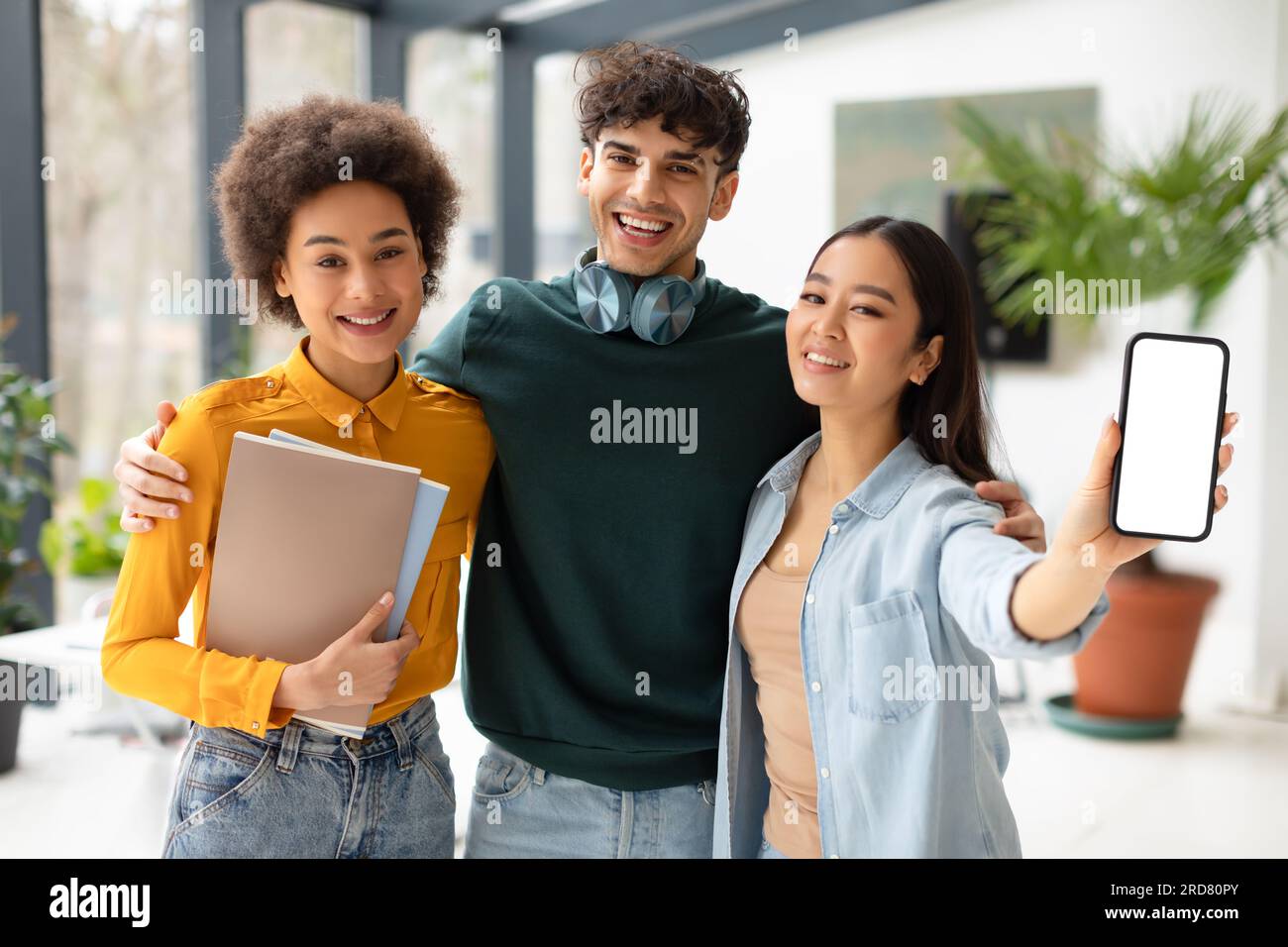 Cool educational ad. Happy diverse students embracing and asian lady ...