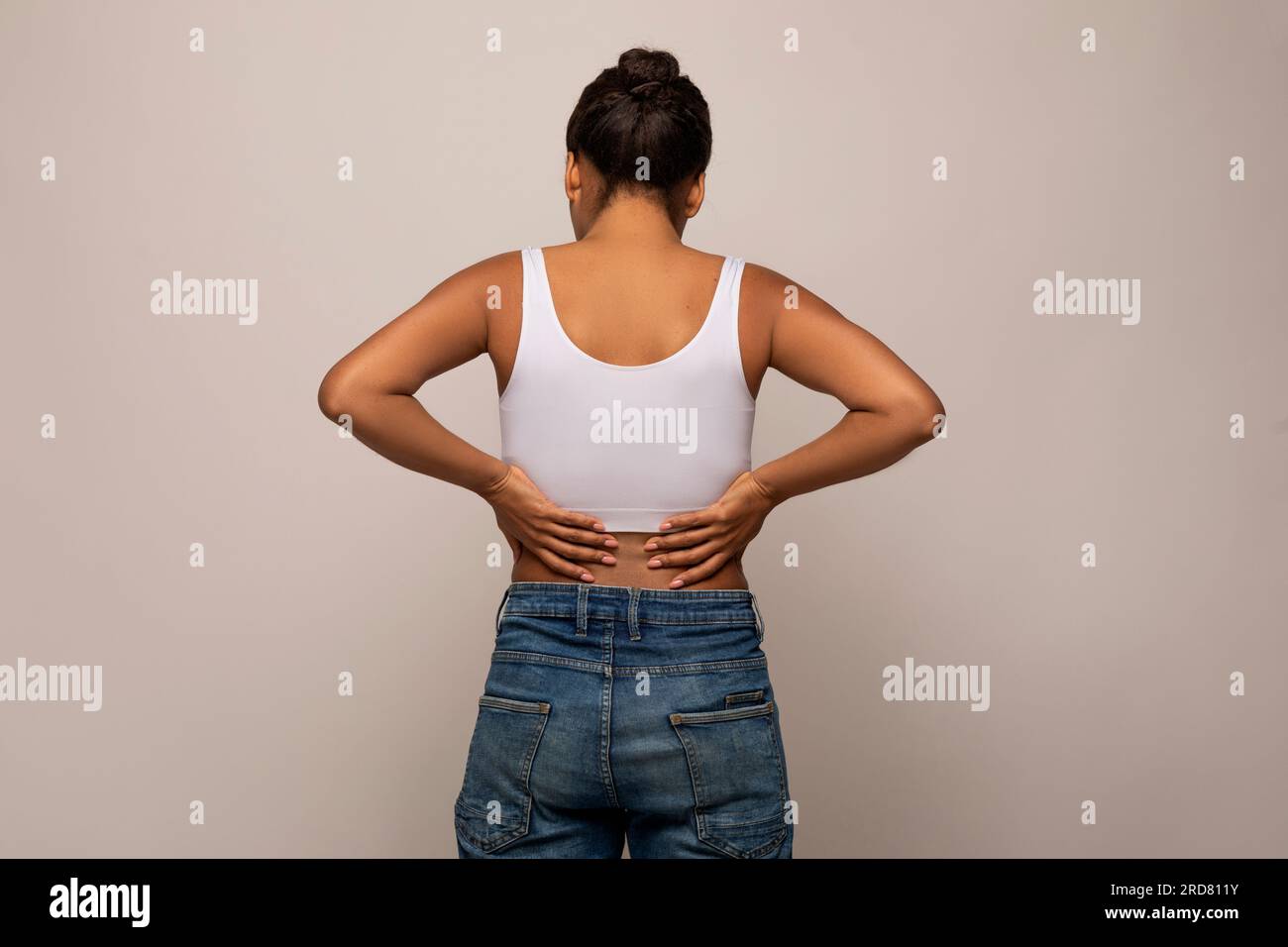 Lower back pain rear view woman hi-res stock photography and images - Alamy