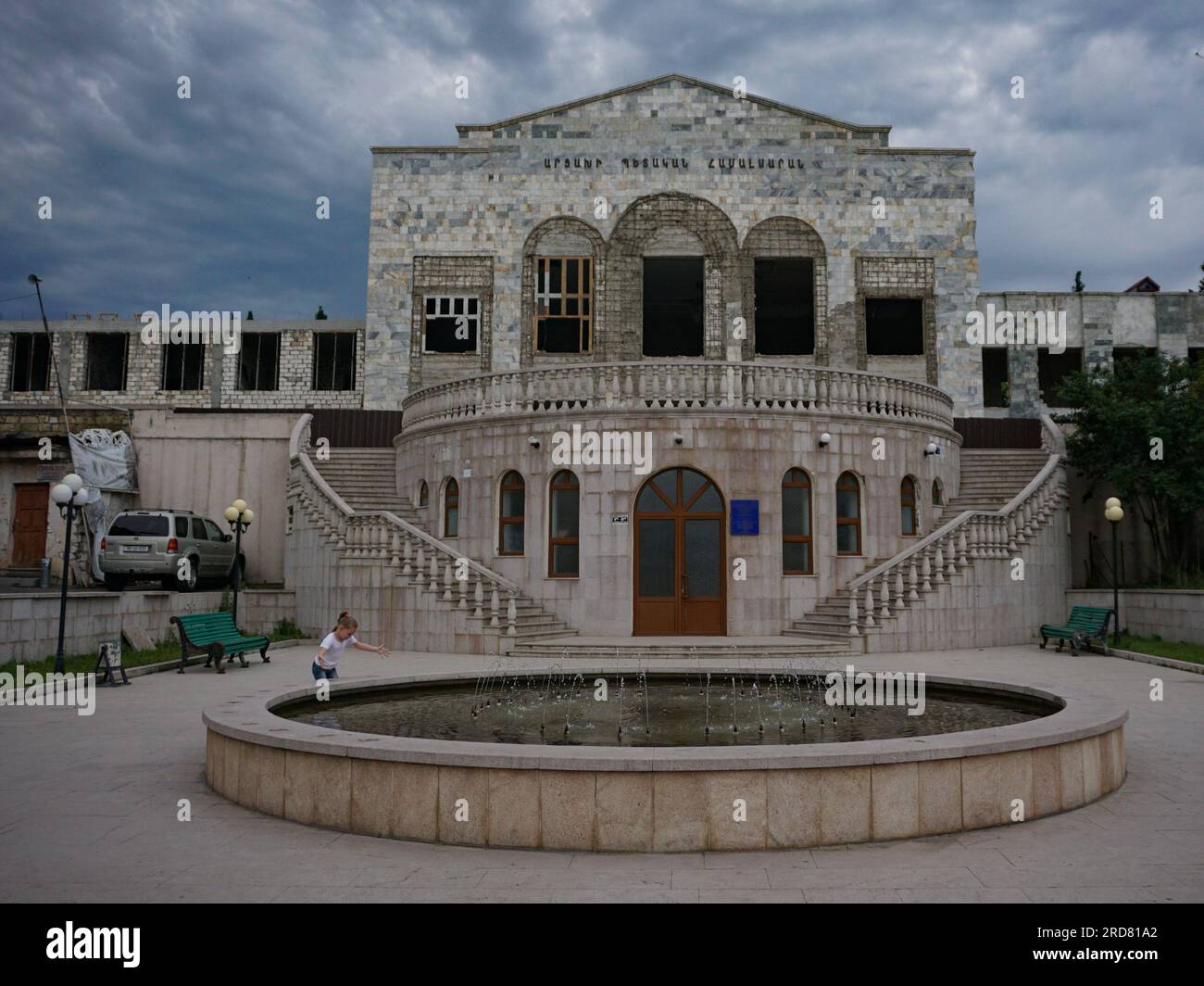 Stepanakert, Azerbaijan. 11th June, 2019. A toddler playing at a water ...