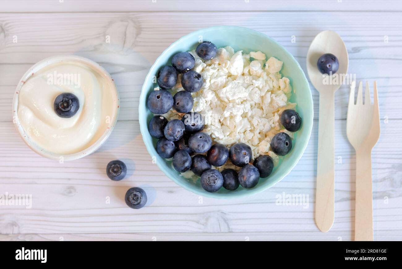 Healthy breakfast. Cottage cheese with blueberries, top view. Healthy ...