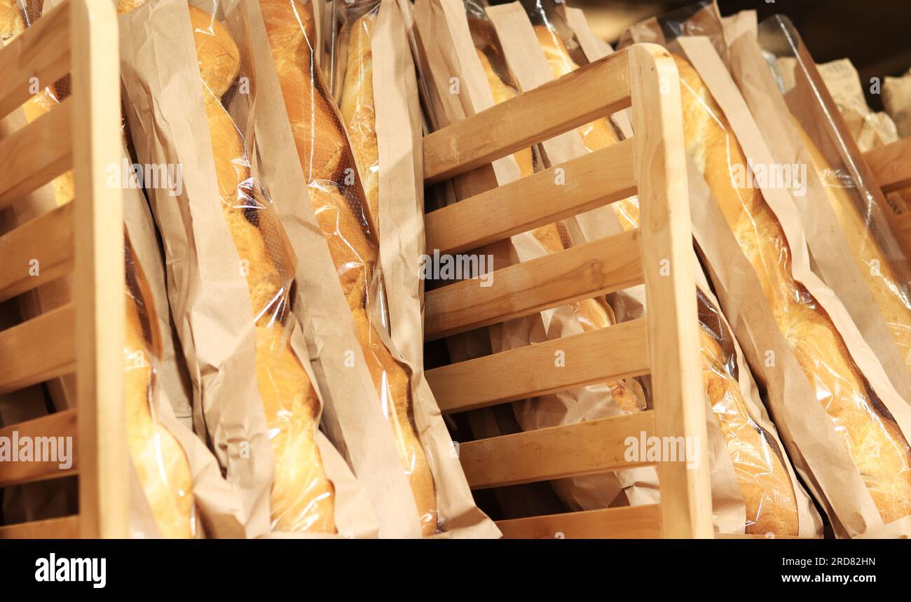Bread in a package in a store on a shelf. Baguettes close-up. Bread in ...