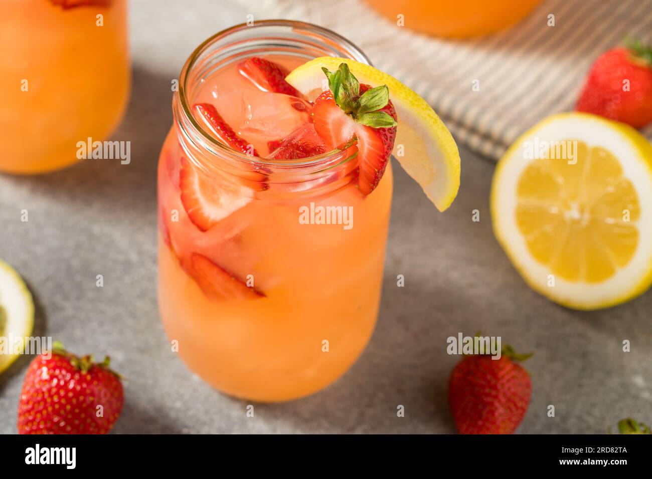 Cold Refreshing Strawberry Lemonade with Ice in a Glass Stock Photo - Alamy