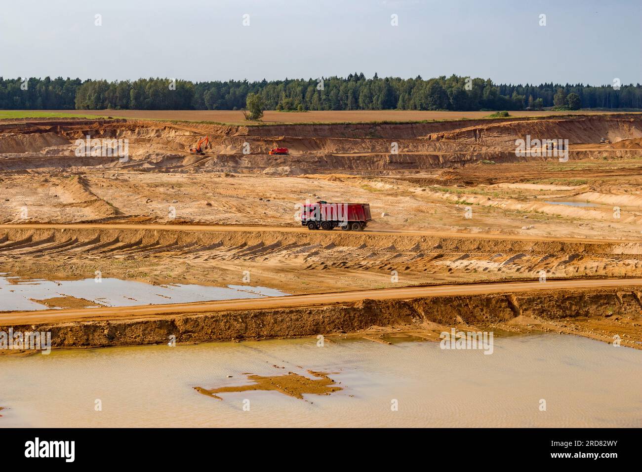 Red dump truck hi-res stock photography and images - Alamy