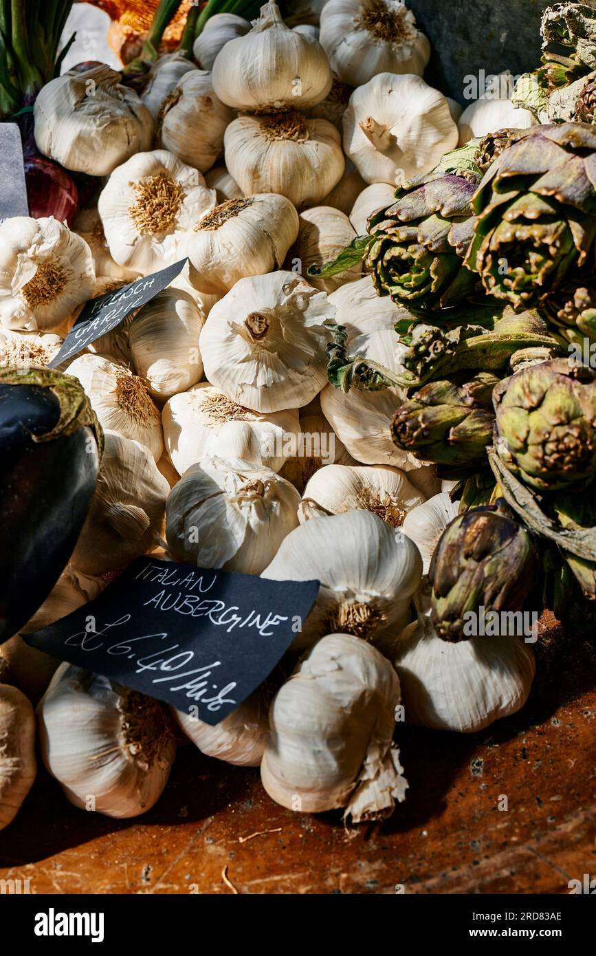 Abundance of fresh, natural garlic on market stall for healthy eating ...