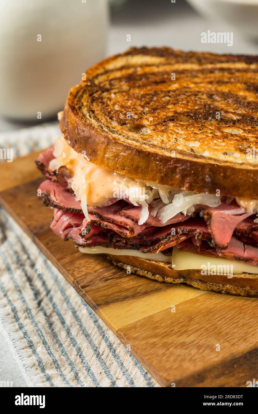 Homemade Russian Reuben Sandwich with Cheese and Chips Stock Photo - Alamy