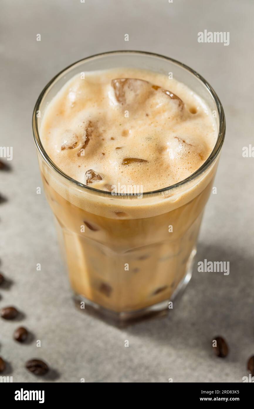 Cold Shake Oatmilk Latte with Ice in a Glass Stock Photo - Alamy