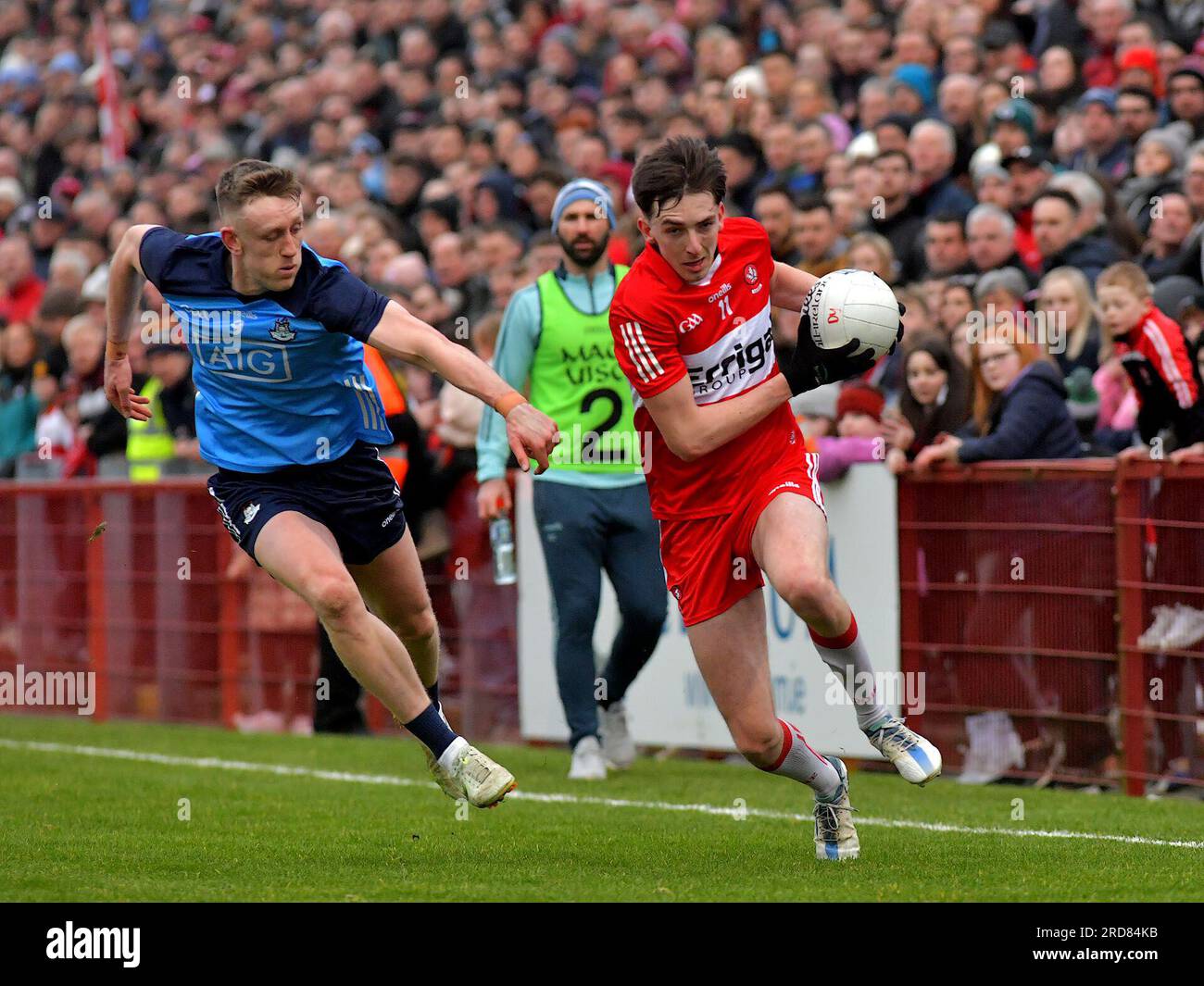 Derry’s Paul Cassidy evades a challenge from Tom Lahiff of Dublin ...