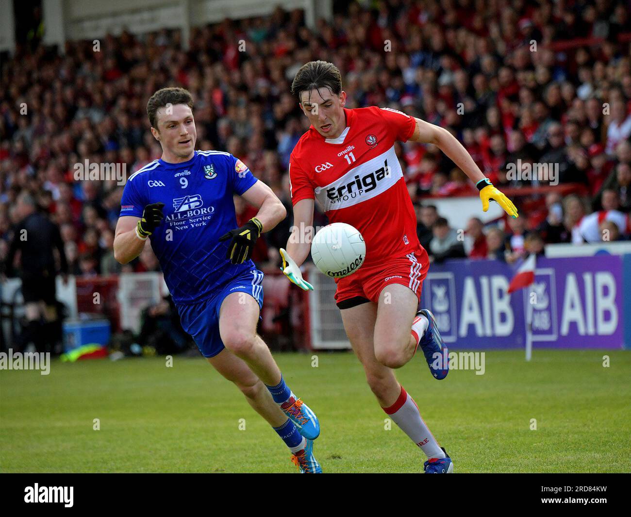 Monaghan's Killian Lavelle chases Paul Cassidy of Derry during their ...