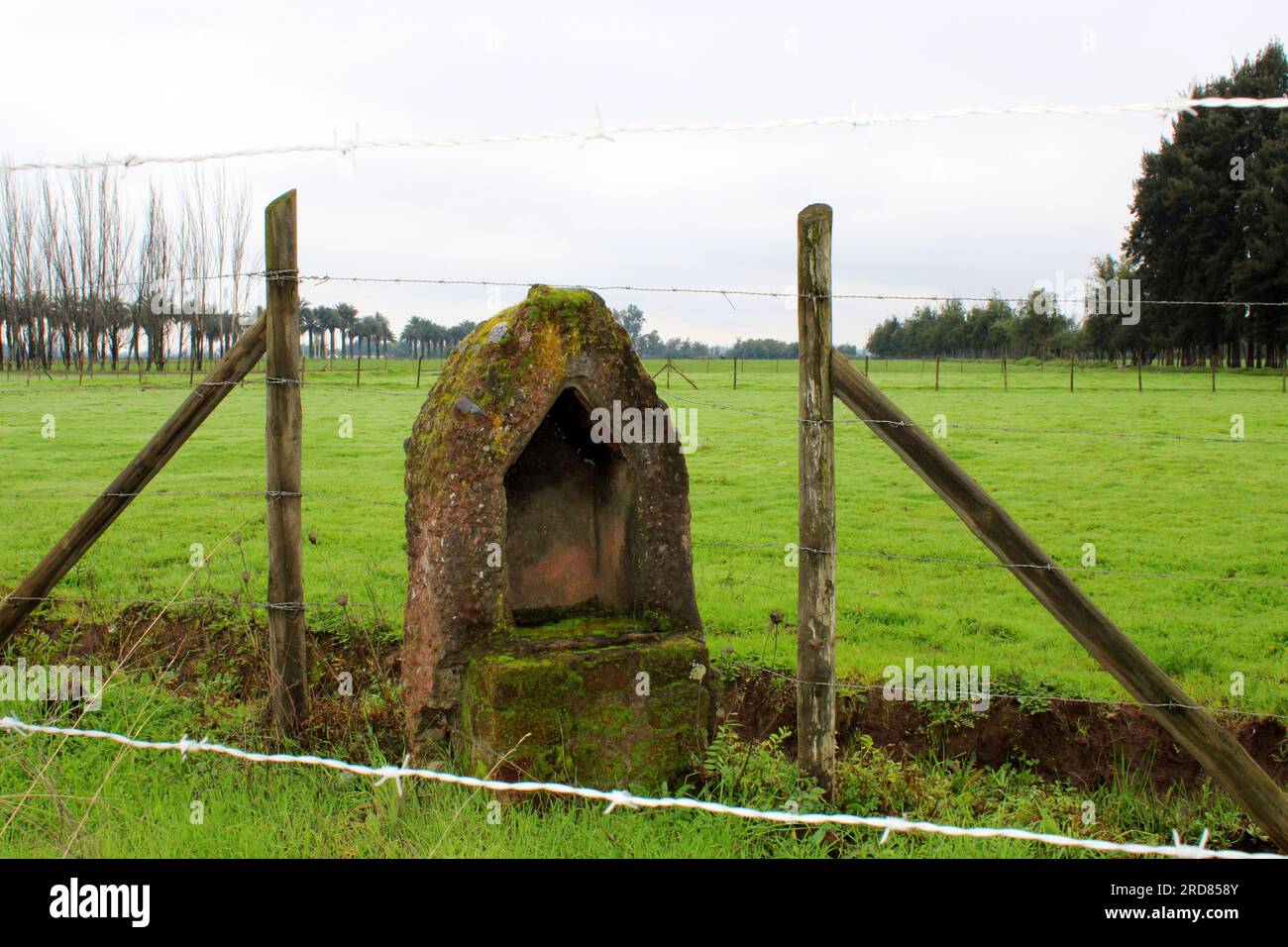 Rural landscape with old abandoned Animita, place of religious ...