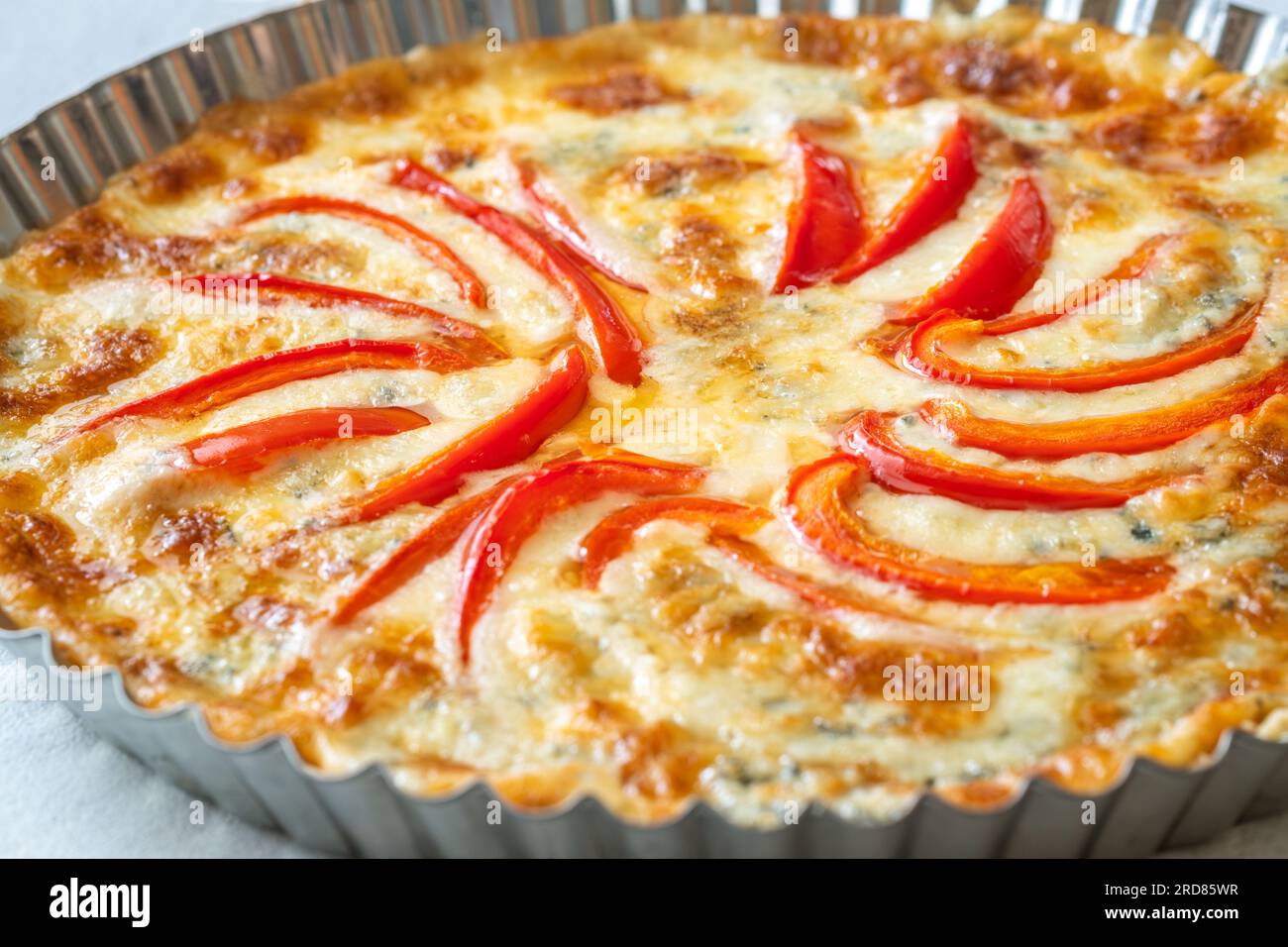 Blue cheese and red bell pepper tart Stock Photo - Alamy