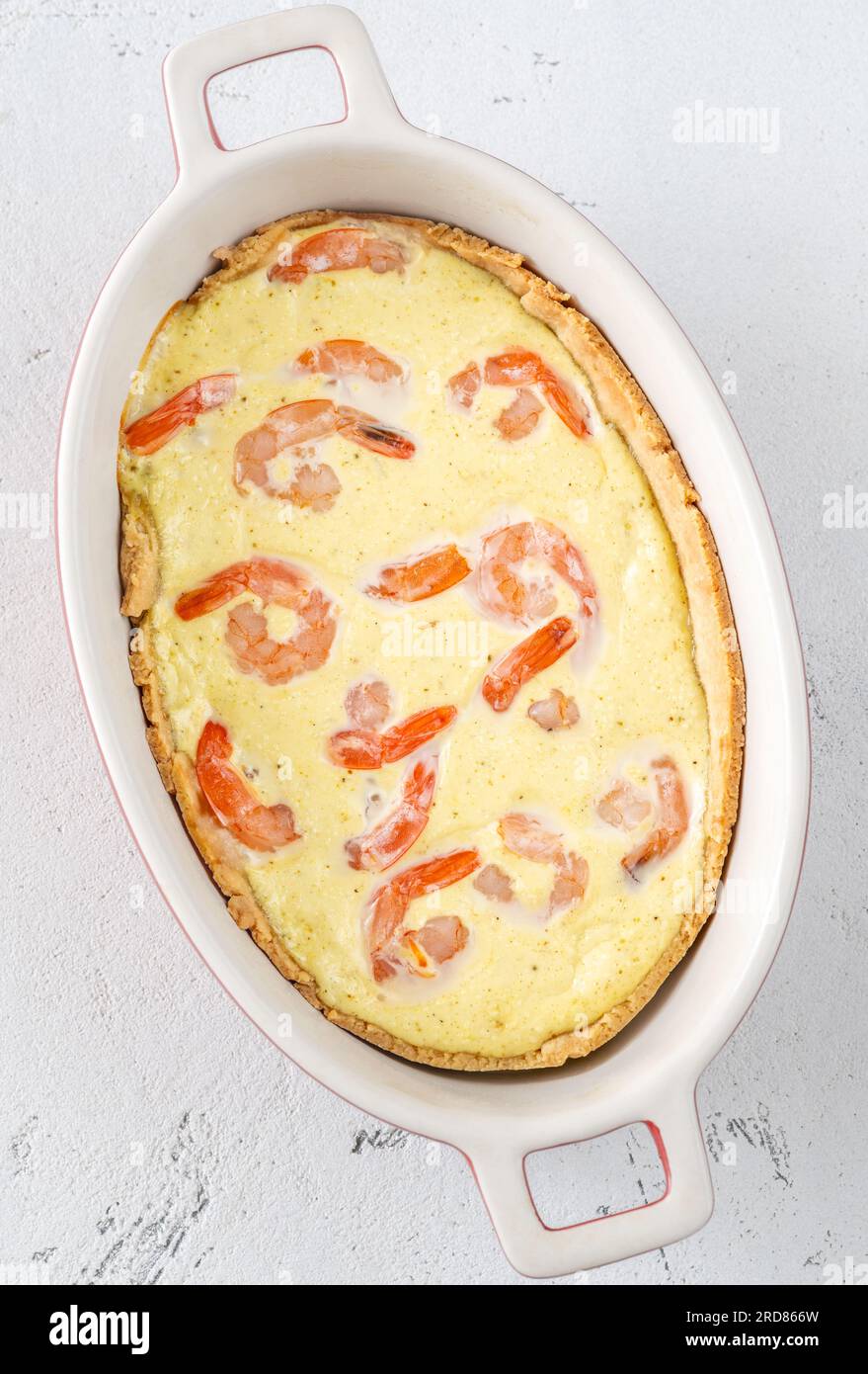 Pie with seafood and saffron cream sauce Stock Photo - Alamy