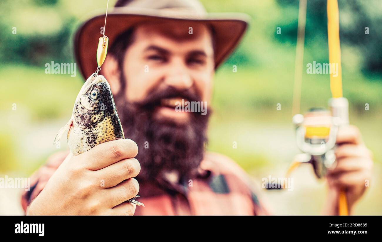 Fisherman and trout. Fishing backgrounds. Man hold big fish trout in ...
