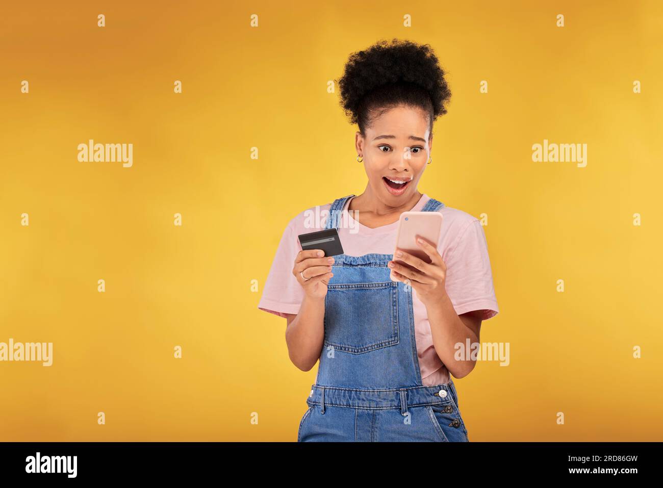 Woman, credit card and wow with phone, studio and shock face for deal ...