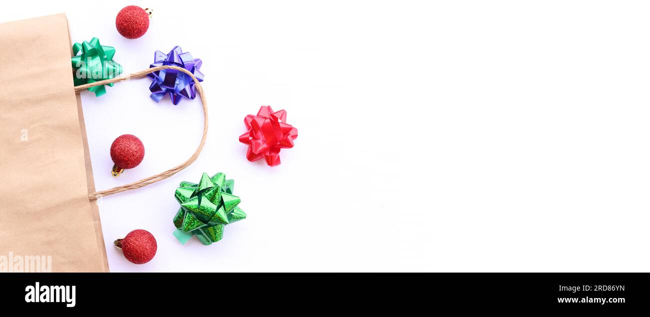 Christmas background with items falling out of a paper bag, top view ...