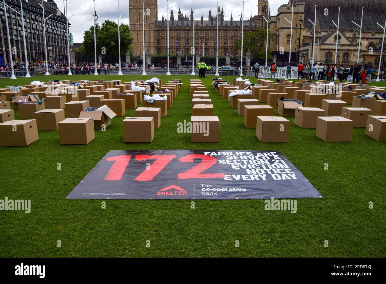 London, UK. 19th July 2023. Campaigners from the charity Shelter lined ...