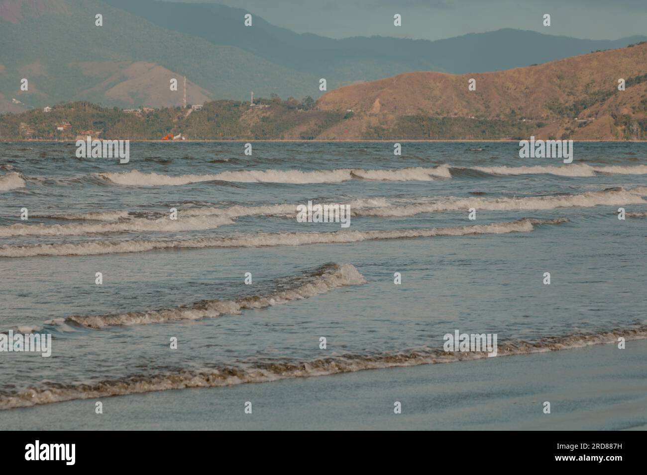 random waves at the beach Stock Photo - Alamy