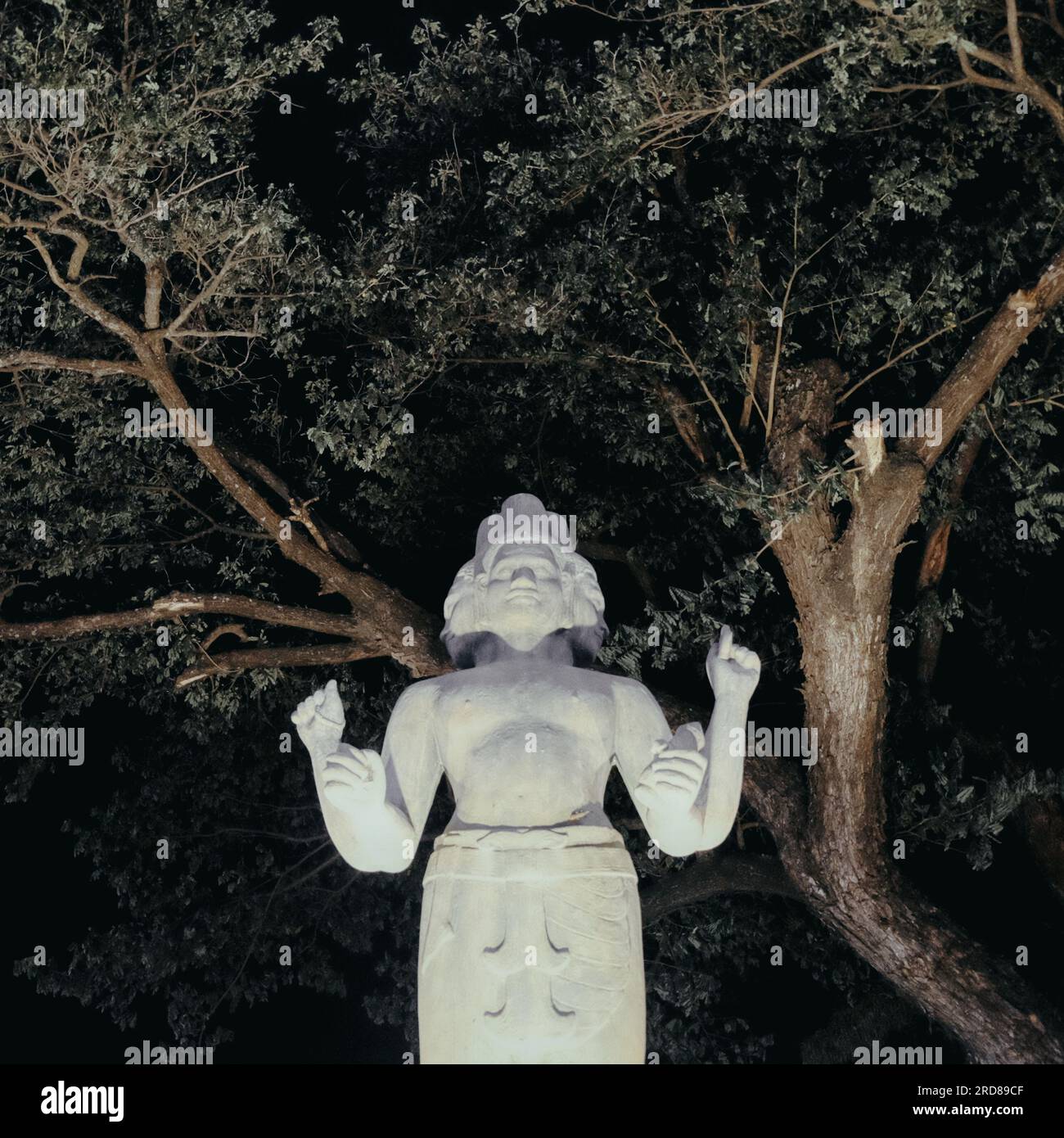 Nighttime photograph showcasing a sculptural representation of a multi ...