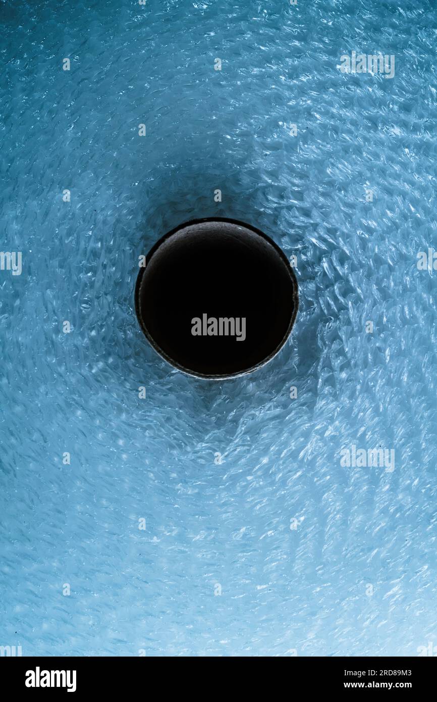 A large roll of blue packaging air-bubble film with a cool color cast ...