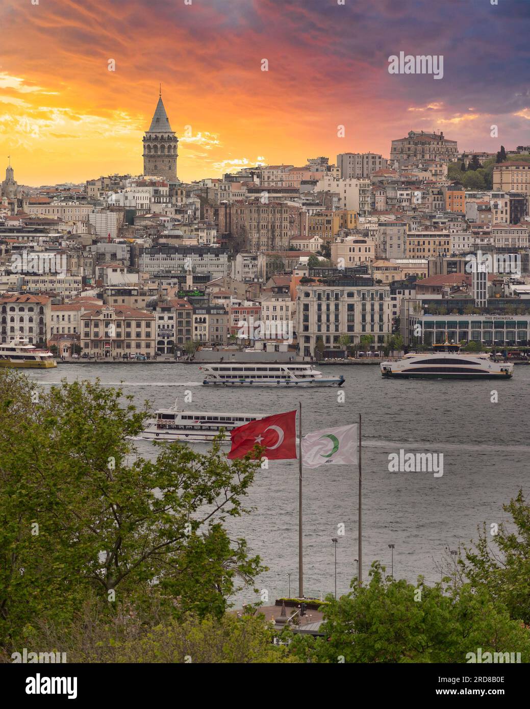 Skyline of European side of Istanbul with ferry boats sailing in ...