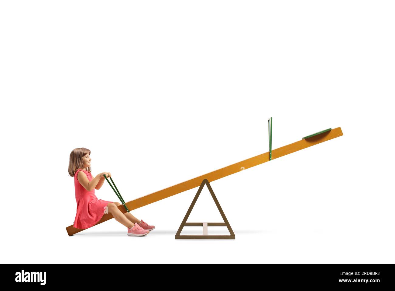 Little girl sitting on a seesaw alone isolated on white background Stock Photo - Alamy