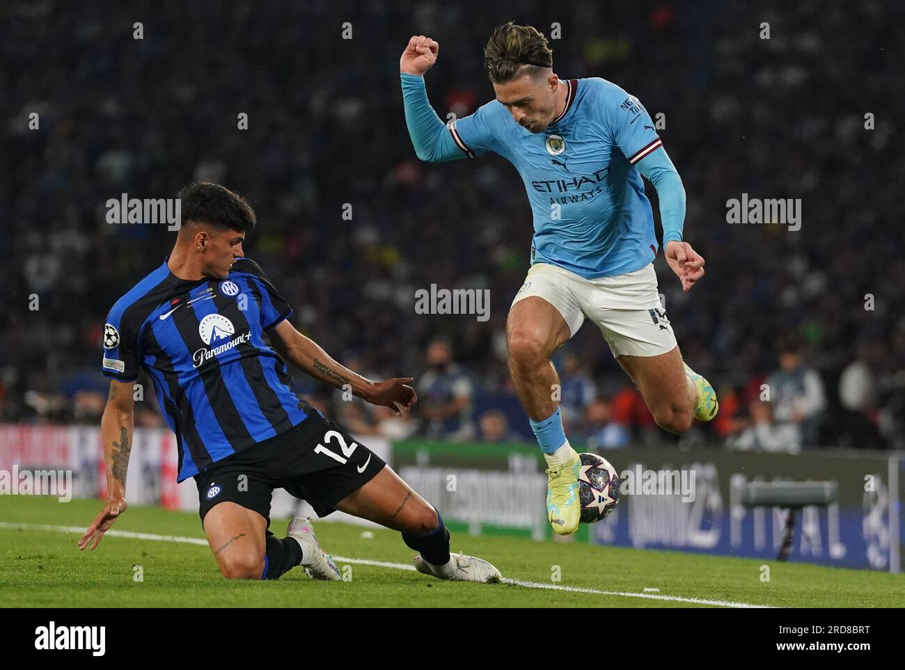 Manchester City's Jack Grealish is tackled by Inter Milan's Raoul ...