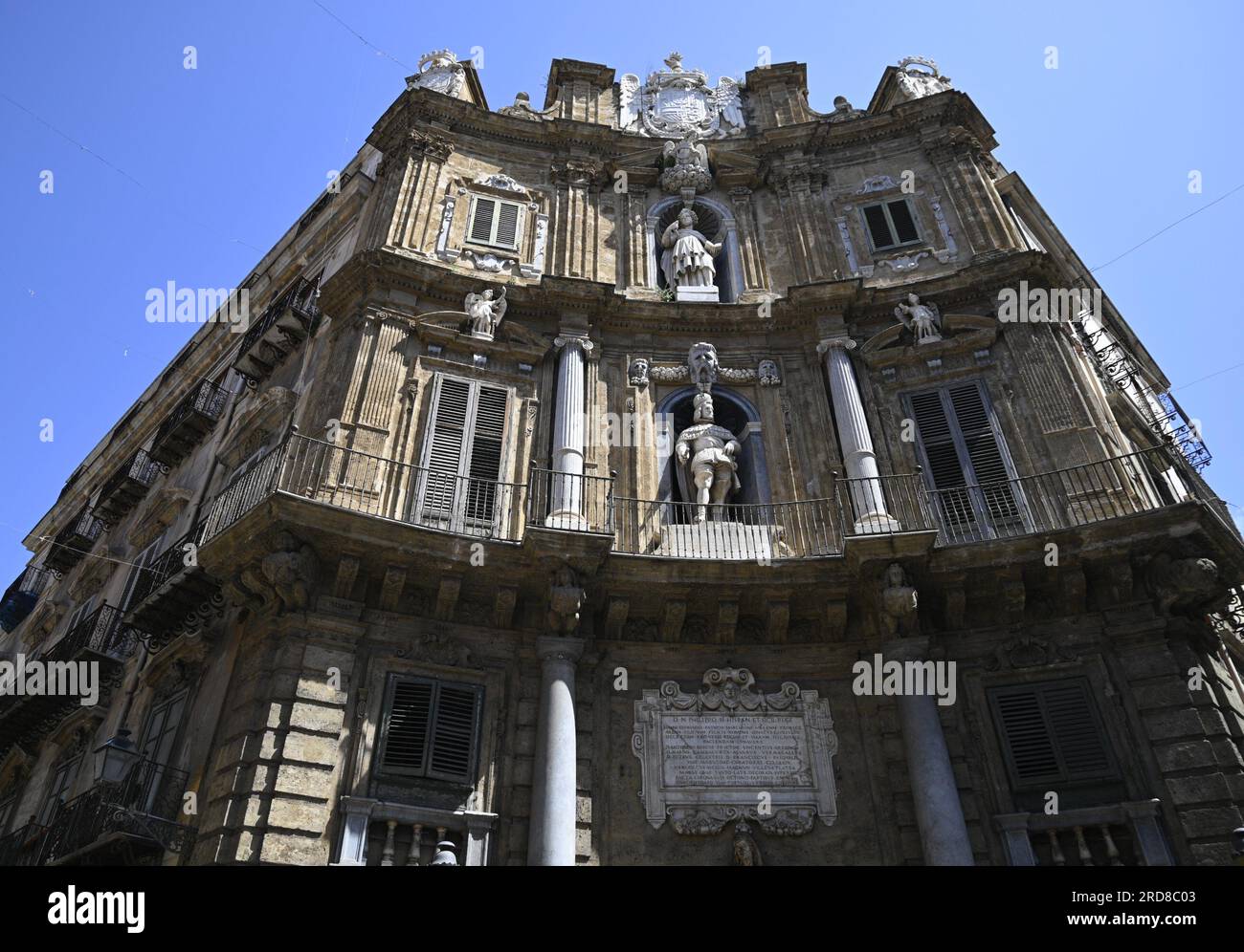 Baroque building at the North East corner of Quattro Canti with the marble sculptures of ...