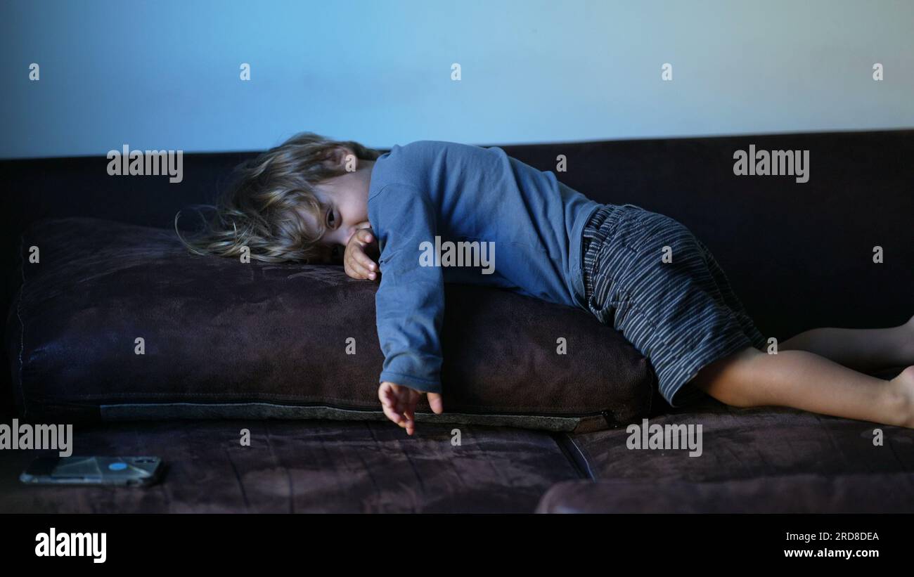 Bored little boy at home with nothing to do child feeling boredom Stock ...