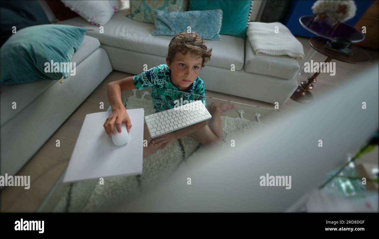 Child browsing internet kid using computer Stock Photo - Alamy