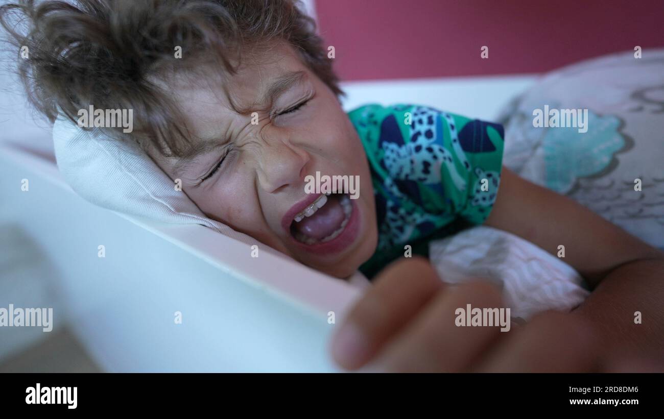 Child grimacing face expression feeling scared and shock Stock Photo ...