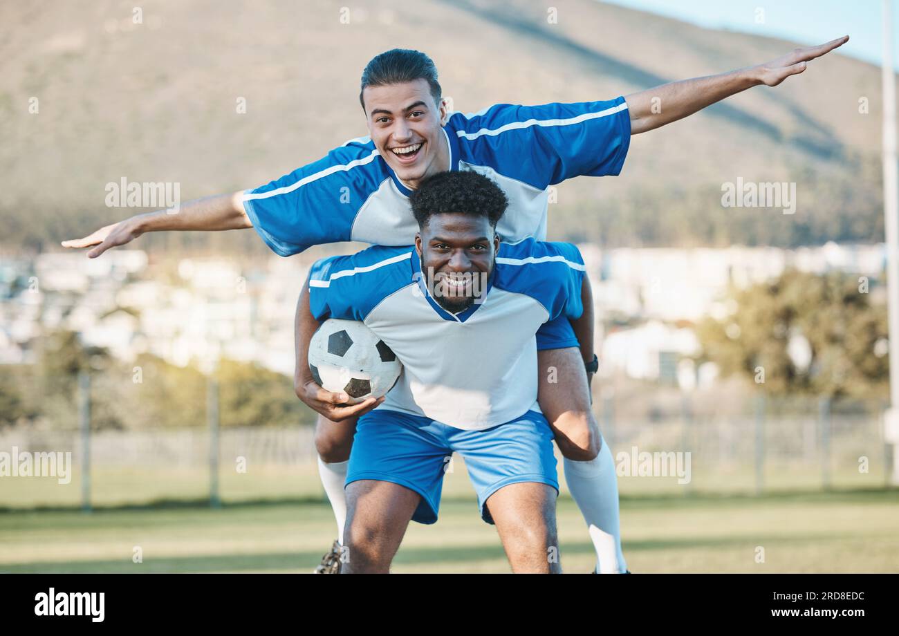 Piggyback celebration football hi-res stock photography and images - Alamy