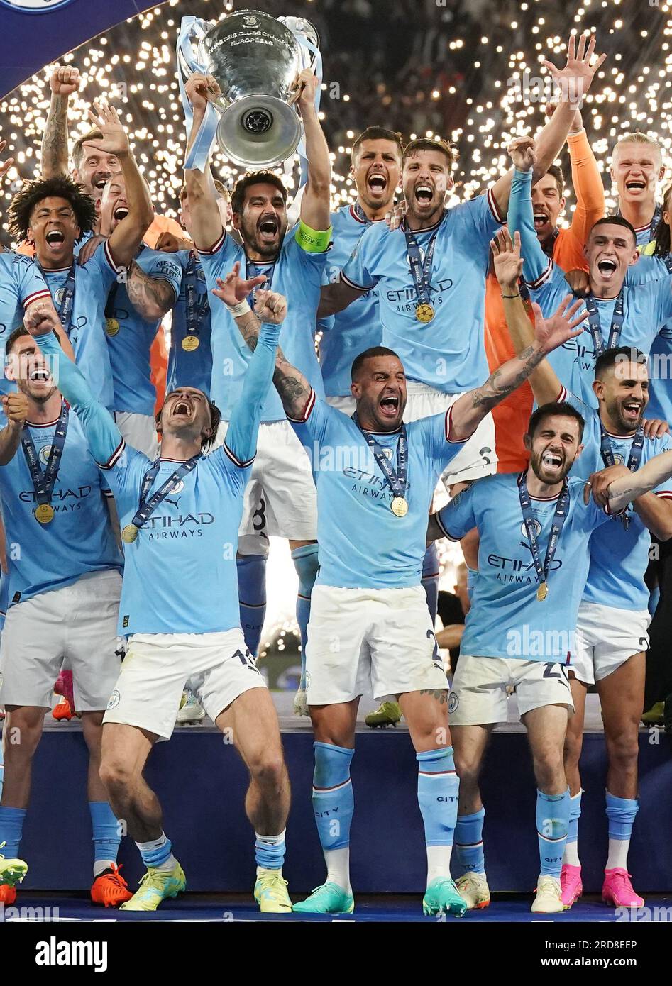 Manchester City captain Ilkay Gundogan lifts the Champions League ...