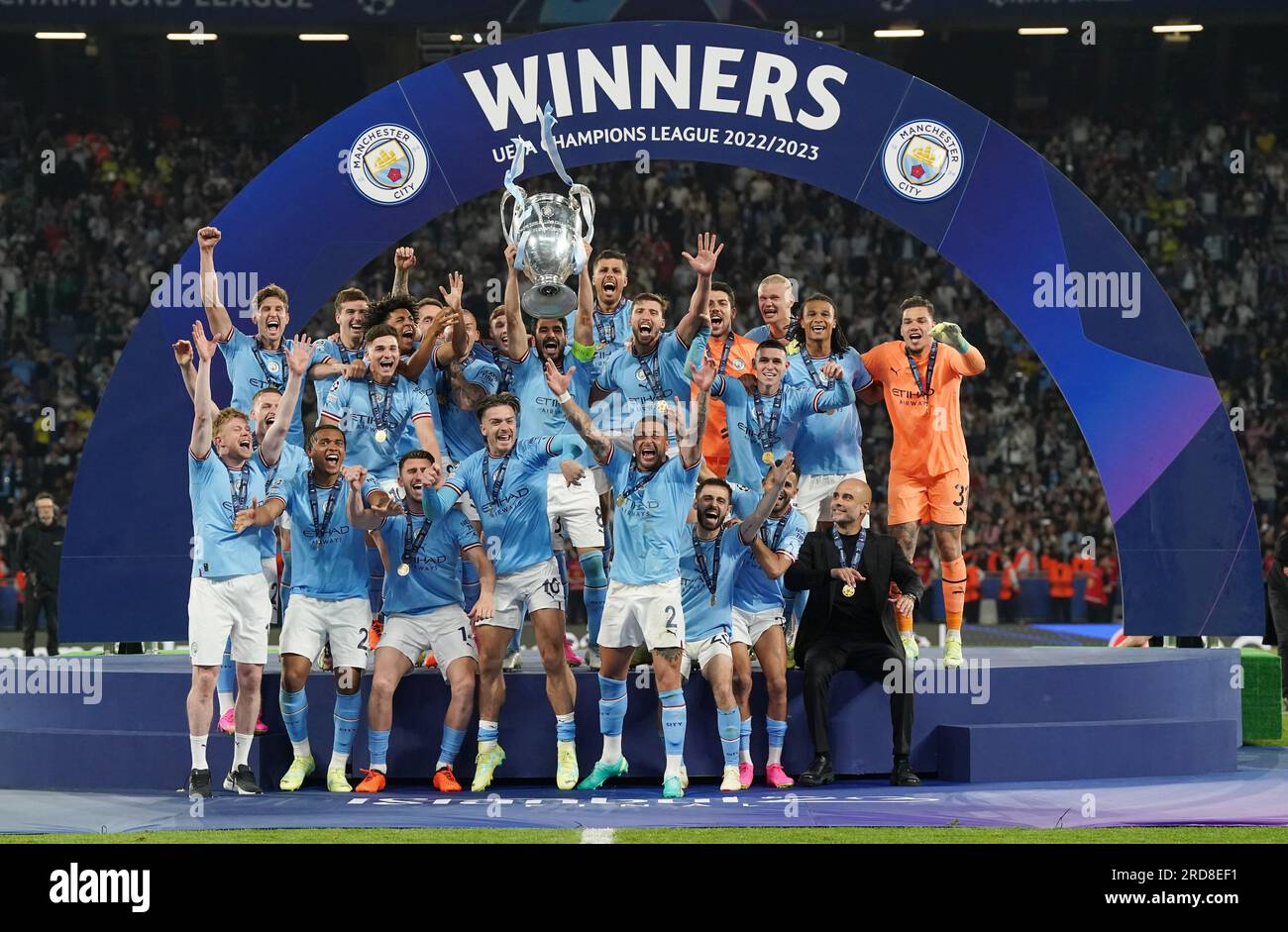 Manchester City captain Ilkay Gundogan lifts the Champions League ...