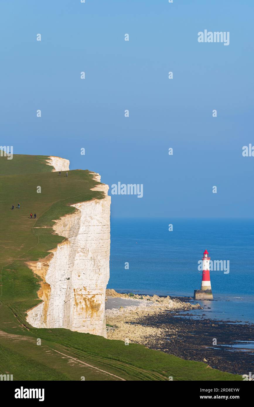 Beachy Head Light house at low tide, Seven Sisters chalk cliffs, South ...