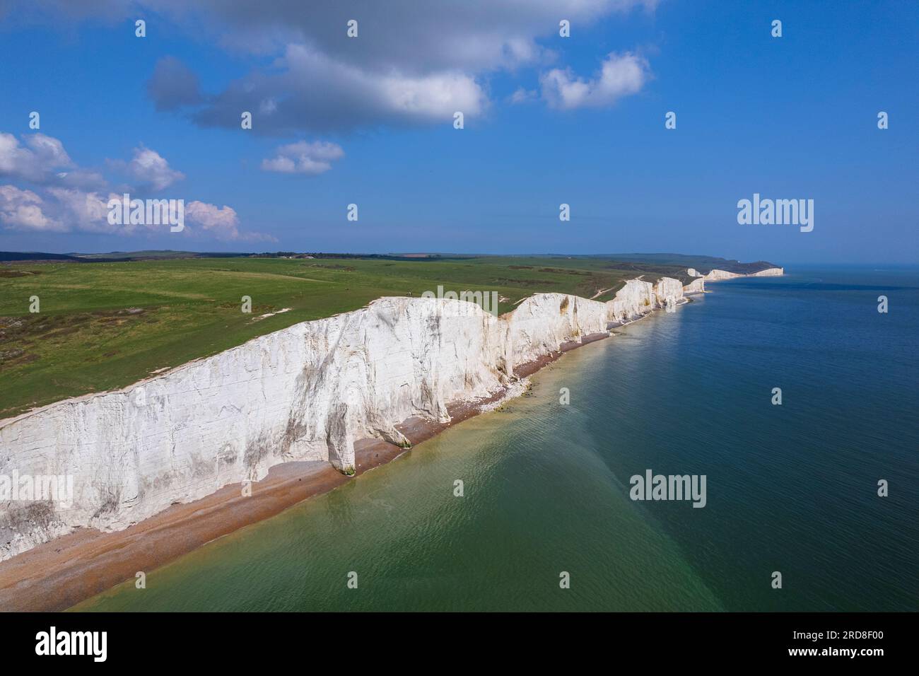 Aerial view of the Seven Sisters chalk white cliffs on a sunny day ...