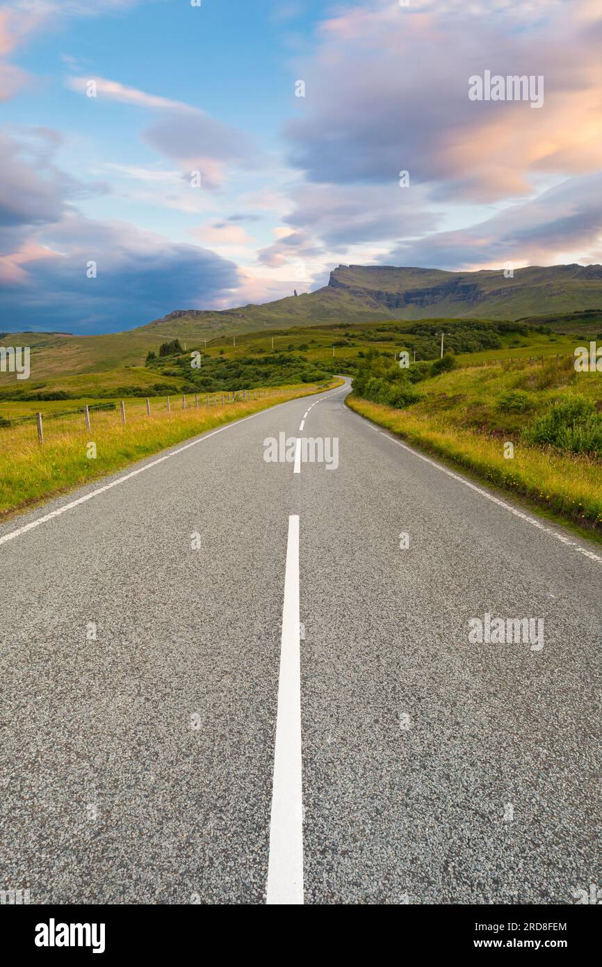 Classic Scottish road during a beautiful summer sunset, Isle of Skye ...