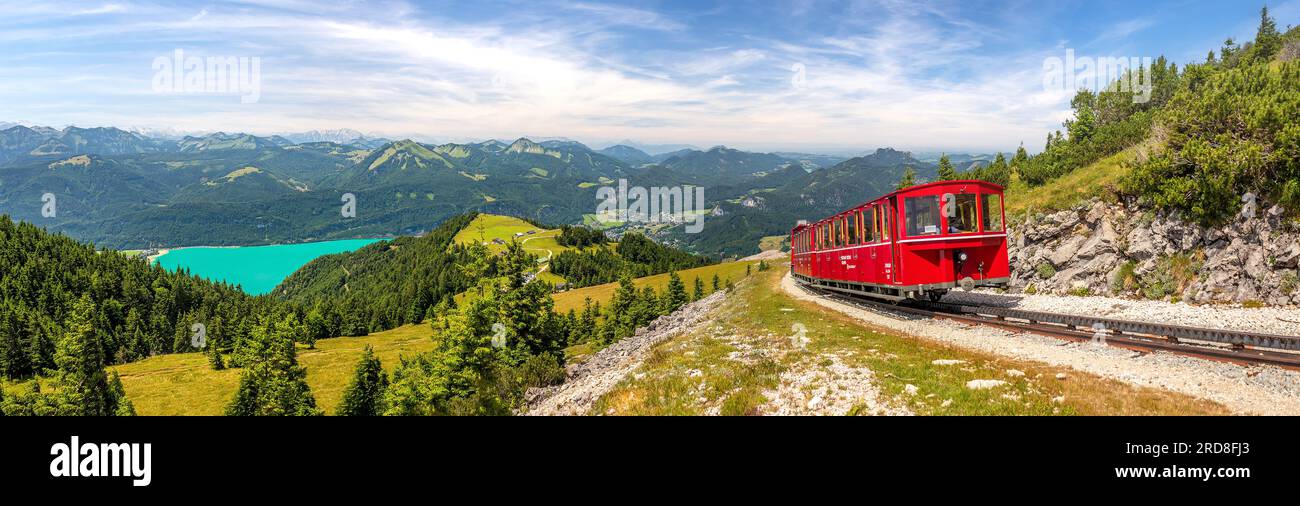 landscape with mountains and a lake Wolfgangsee and Schafberg cog ...