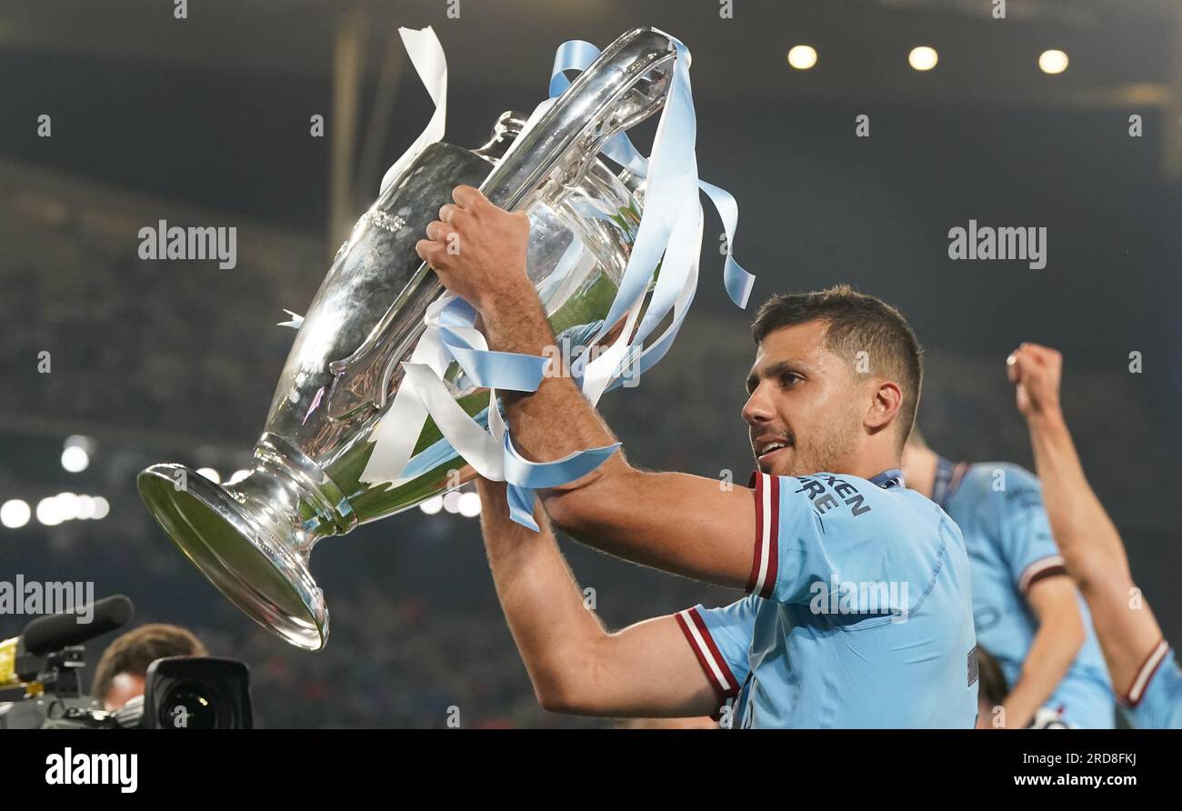 Manchester City's Rodri celebrates with the Champions League trophy ...
