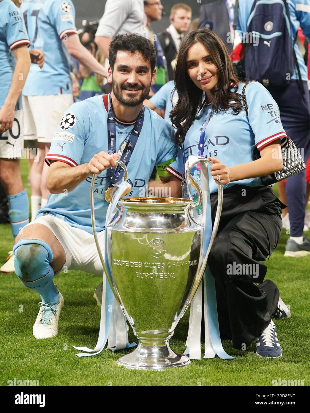 Manchester City captain Ilkay Gundogan poses with the Champions League ...
