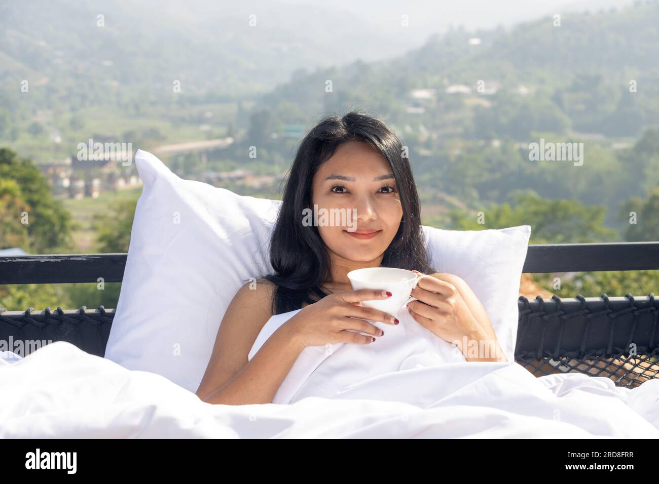 Young woman sun bed hi-res stock photography and images - Alamy