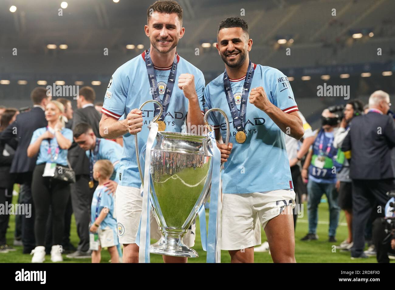 Manchester City's Aymeric Laporte (left) and Riyad Mahrez pose for a ...