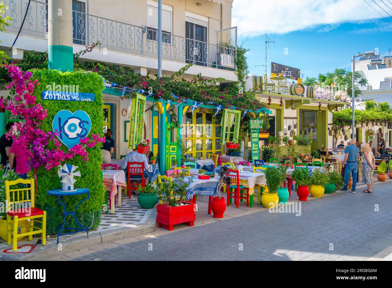 View of colourful cafe and restaurant in Kos Town, Kos, Dodecanese ...