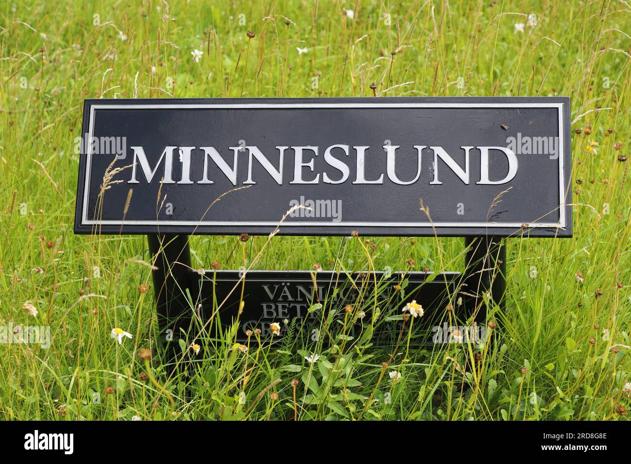 Sign in Swedish indicating a memorial grove at the cemetery with ...