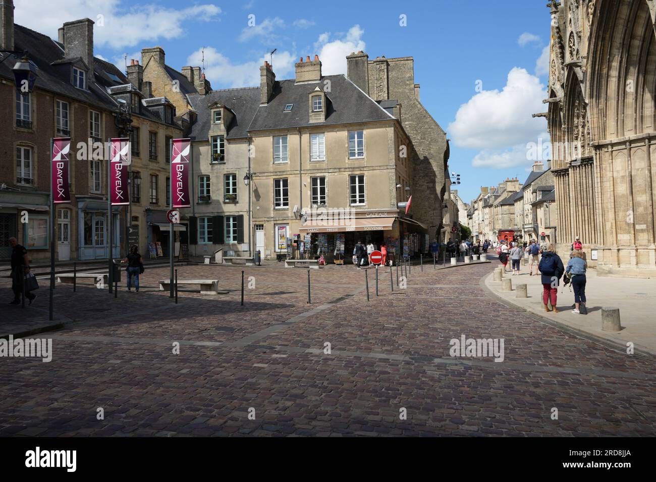 The City Centre outside The Cathedral, with cobbled street and Bayeux ...
