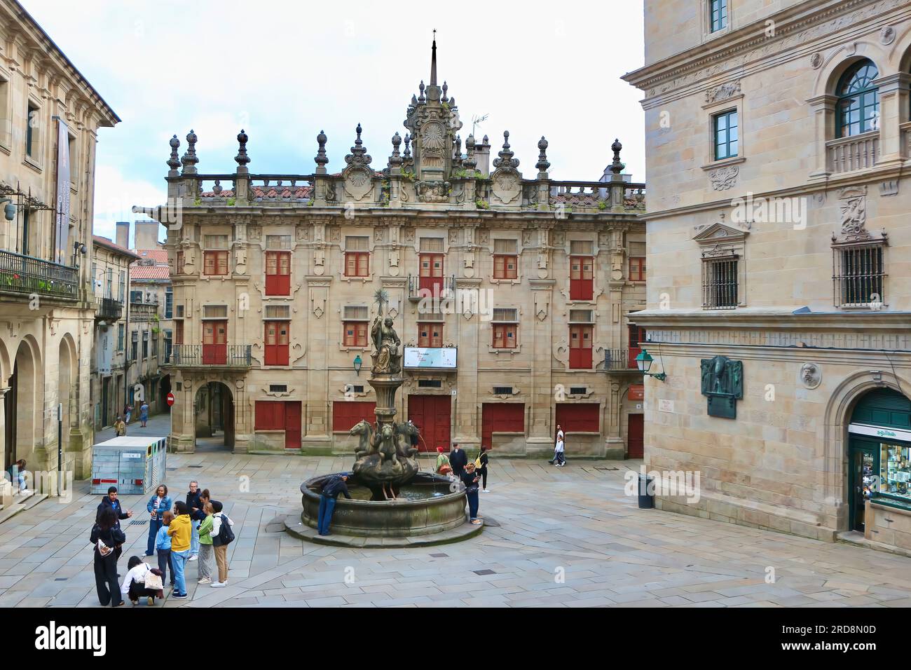 Woman rising a star on a Marmoric ark on the horse fountain in front of ...